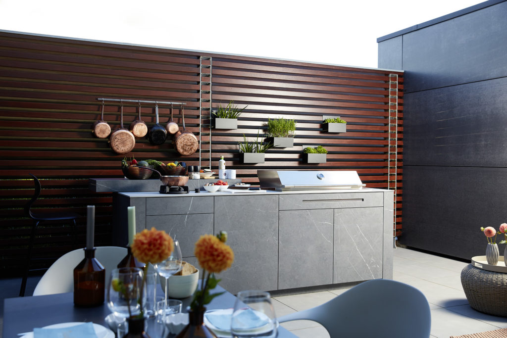 BBQtion outdoor kitchen in ceramic for the atrium | Village Garden